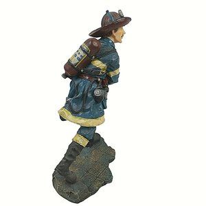 unmarked | Accents | Firefighter Figurine With Child Oxygen Tank ...